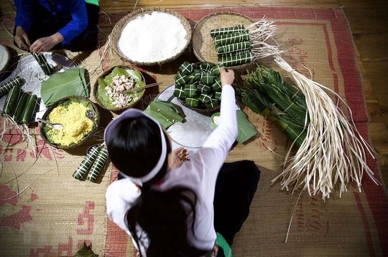 Envoltura de “banh chung” y “banh ong”, la belleza cultural del pueblo ...